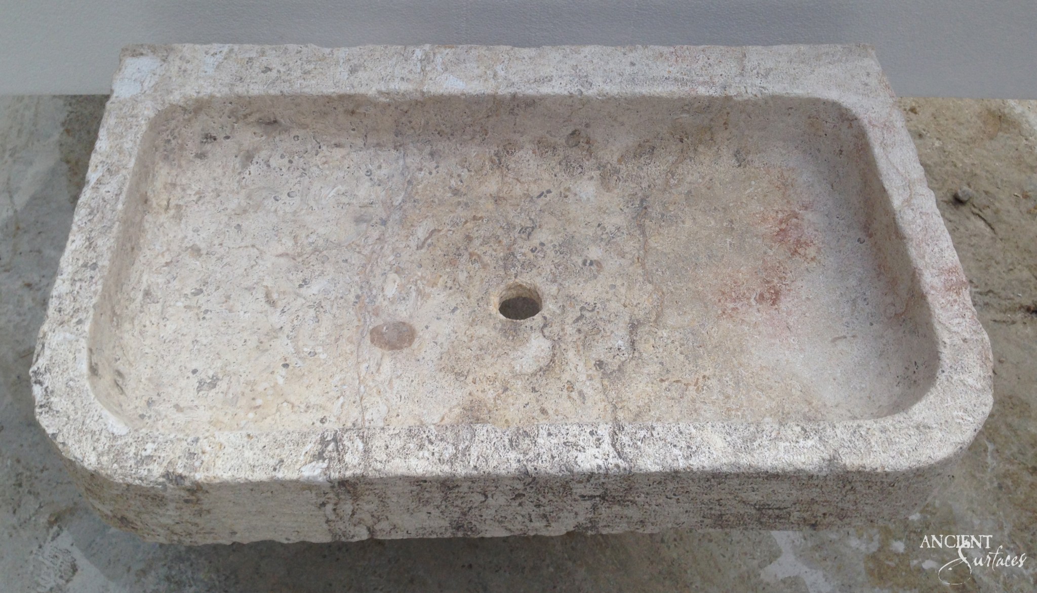 The Symphony of Stone: Antique Limestone Sinks by Ancient Surfaces